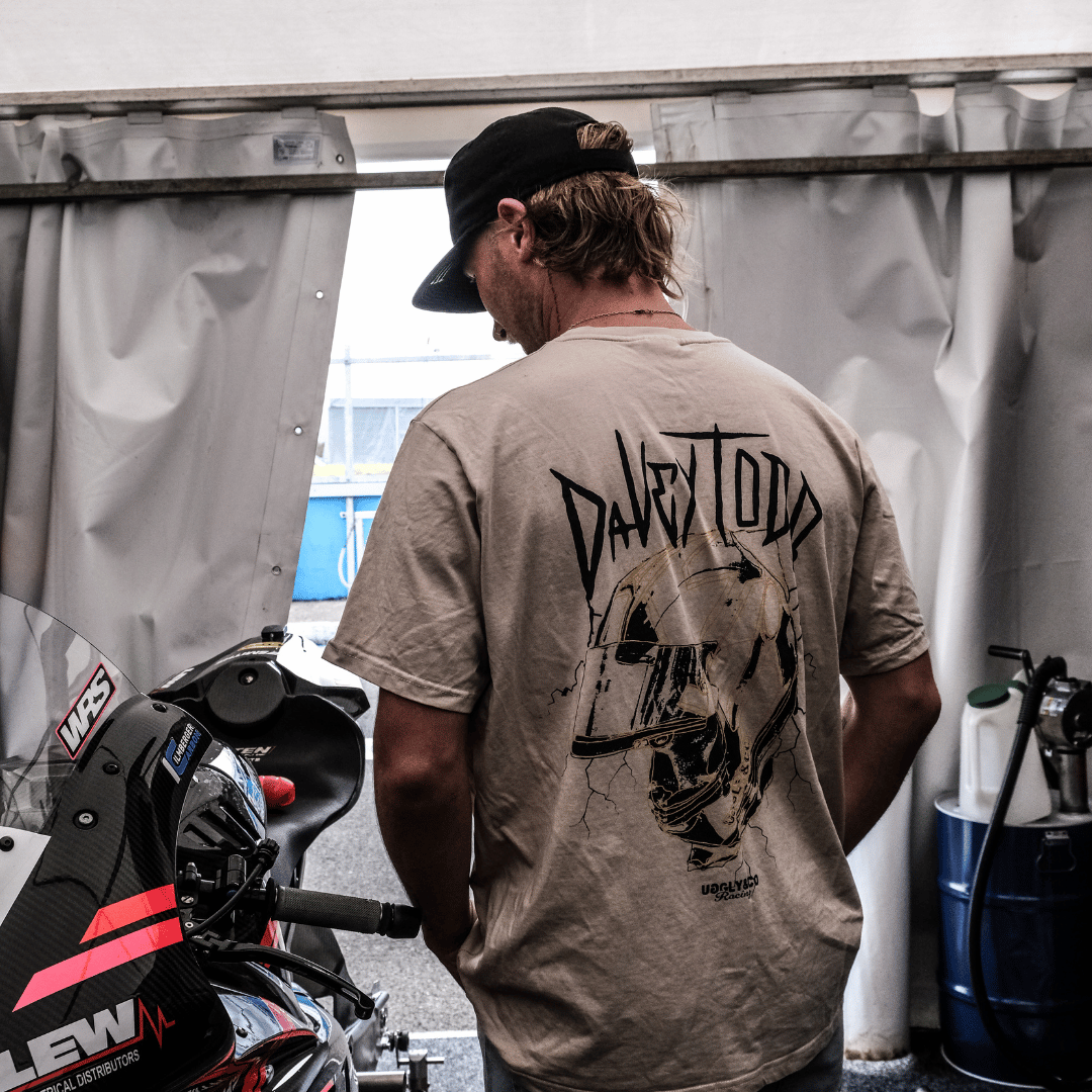 Davey Todd ‘Lightning Bolt’ Beige Tee – Fan Merch